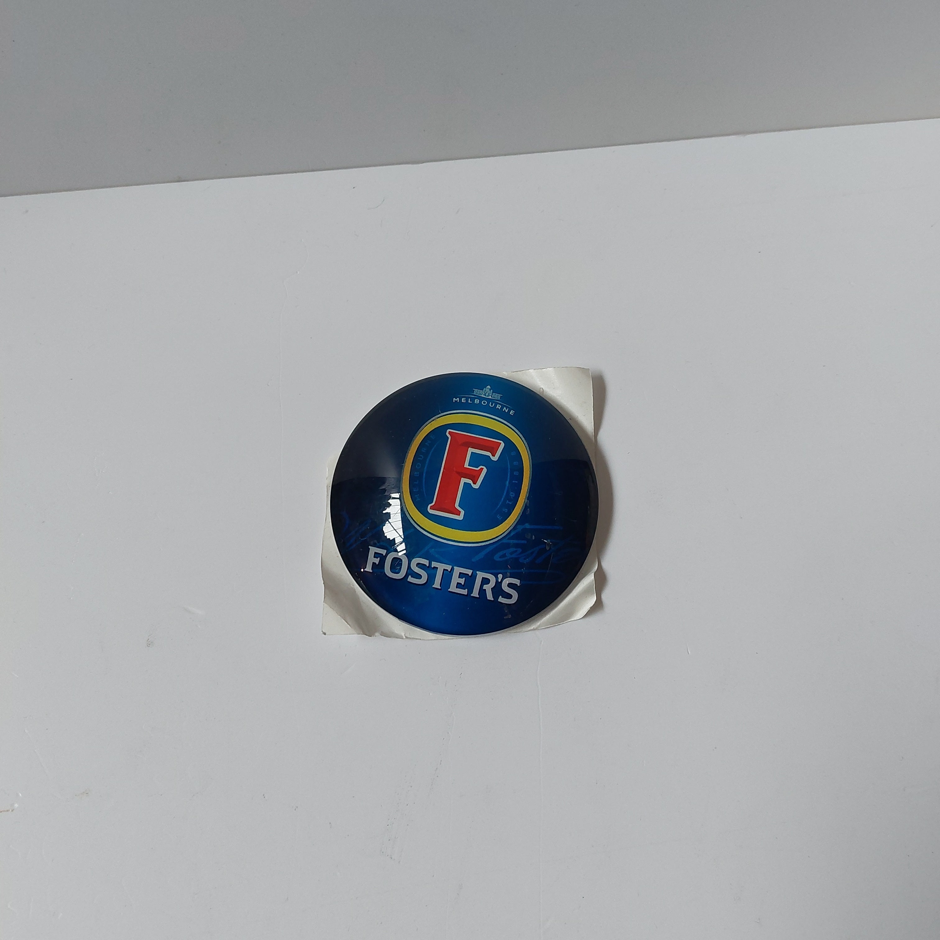 Fosters round badge – PUB SUPPLIES